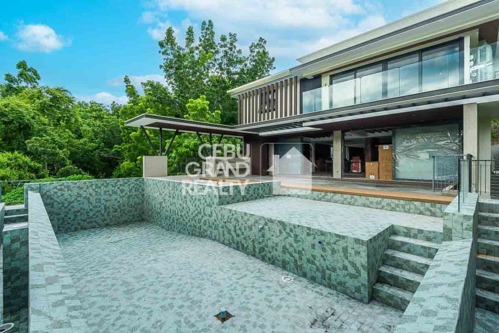 Luxurious Modern Home with Breathtaking Views In Maria Luisa Estate ...